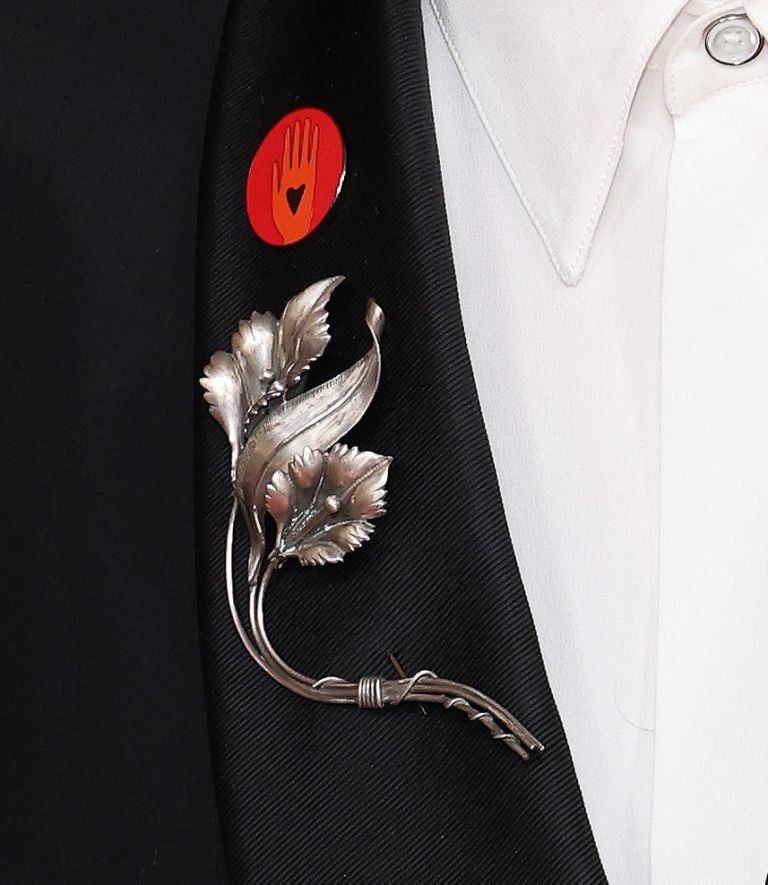 Oscar Red Pins Explained | The Mary Sue